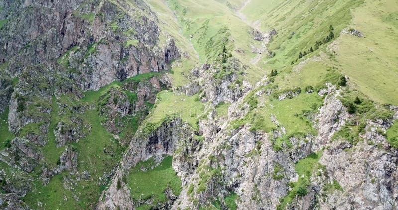 Top View of Steep Mountain Cliffs and an Ice Cave. Stock Footage ...