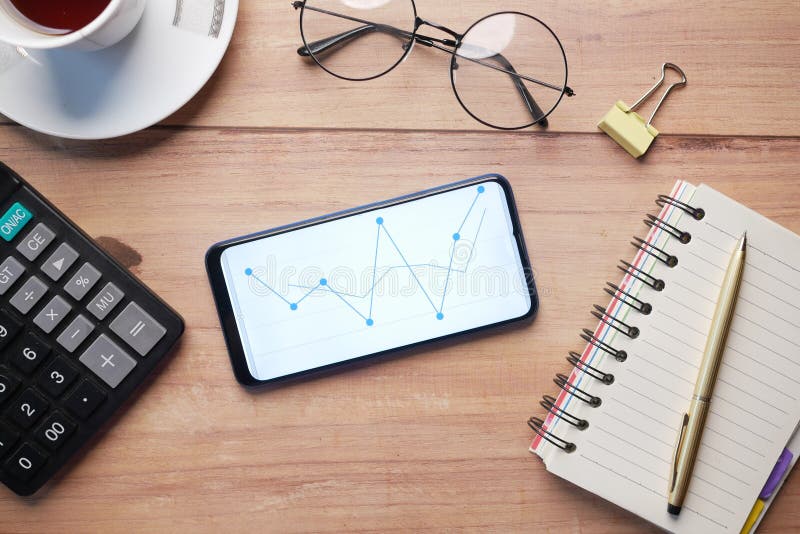 Top View of Stock Chart Display on Smart Phone on Table Stock Image ...