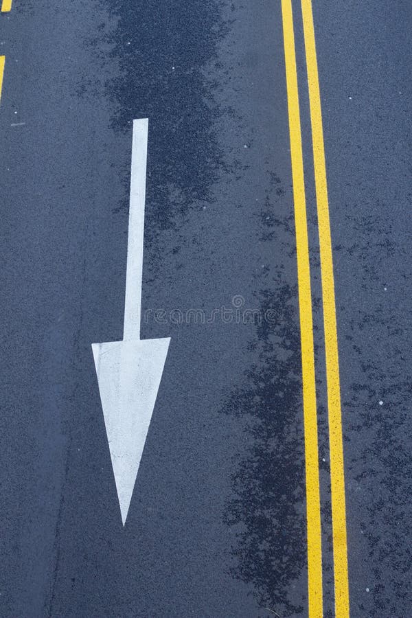 Street with Double Track and Arrow Lines Stock Image - Image of gray ...