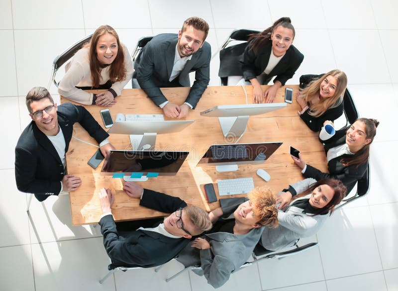 Top View. a Successful Team of Young Employees Looking at the Camera ...