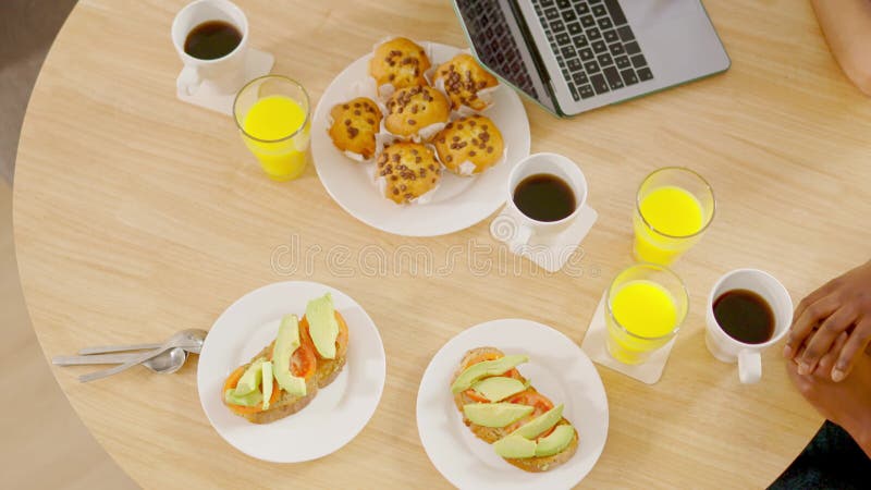 Top View of a Table with Breakfast and a Laptop Stock Video - Video of ...