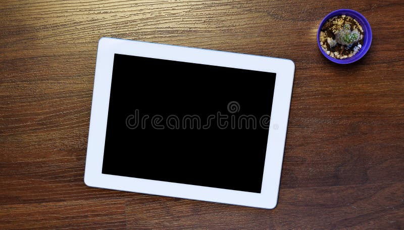 Top View of Tablet Computer on Wooden Table Stock Photo - Image of ...