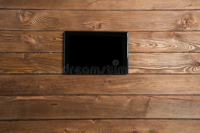 Top View of Tablet Pc Black Device on Wooden Table Stock Image - Image ...