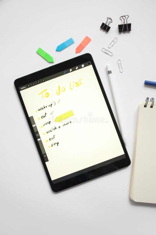 Top View of a Tablet with a "to-do List" on the Screen with Stationery ...