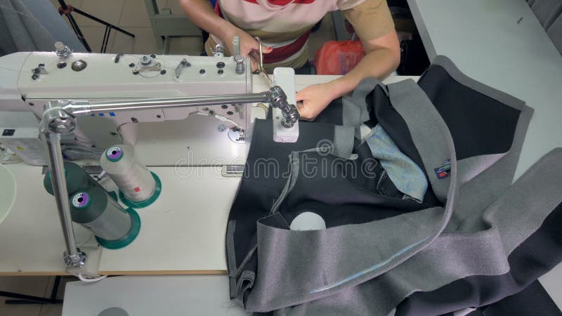 Top View of a Tailor at an Industrial Sewing Machine. Stock Video ...