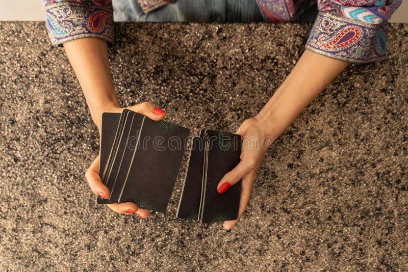 Top View of a Tarot Reader S Hands Mixing the Deck of Tarot Cards Stock ...