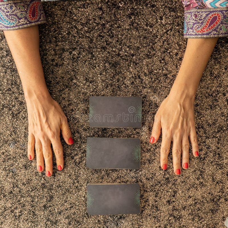 Top View of a Tarot Reader S Hands and Three Cards Turned Face Down ...