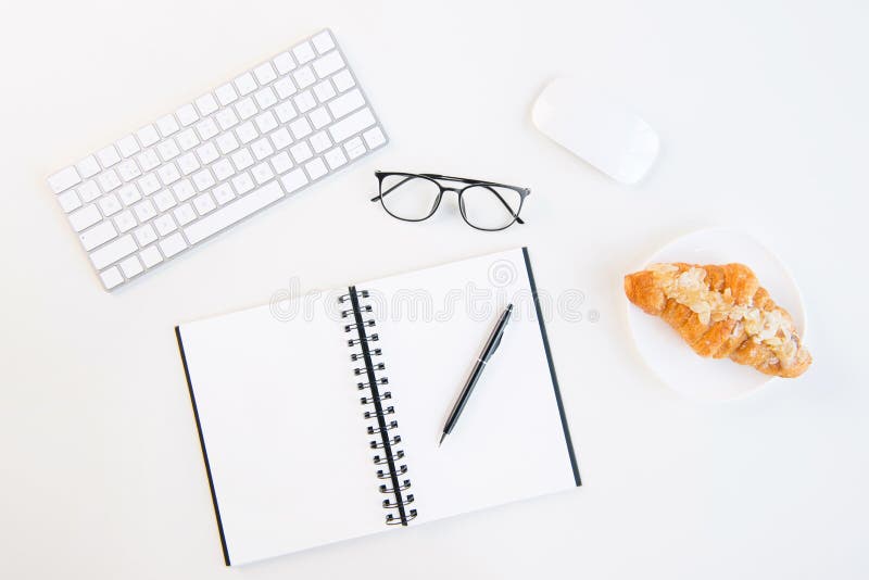 Top View of Tasty Croissant on Plate, Blank Notebook with Pen Stock ...