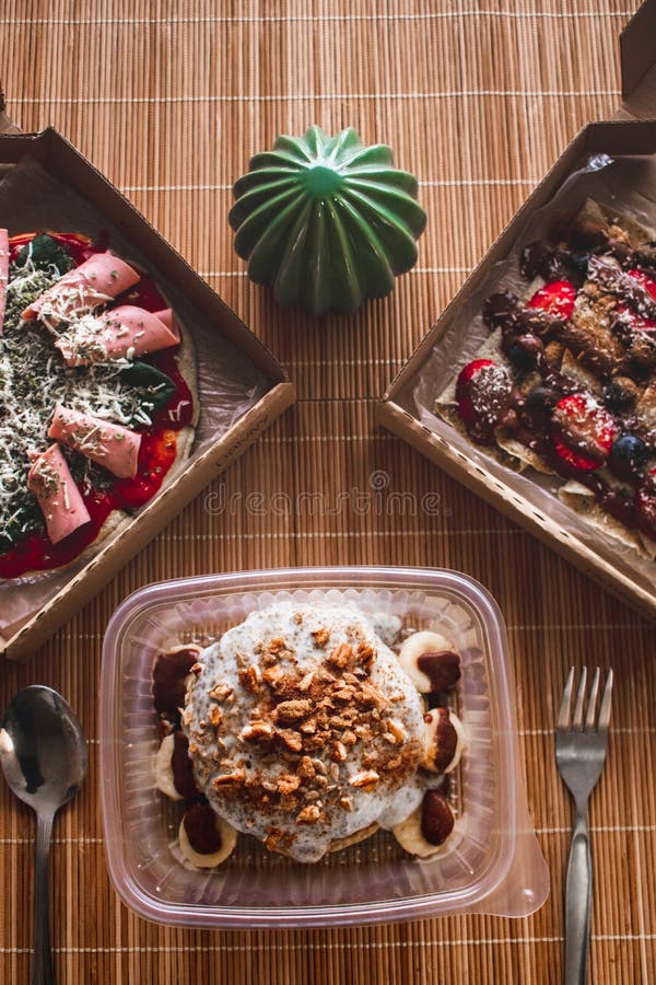 Top View of Tasty Desserts on a Table Stock Photo - Image of boxes ...