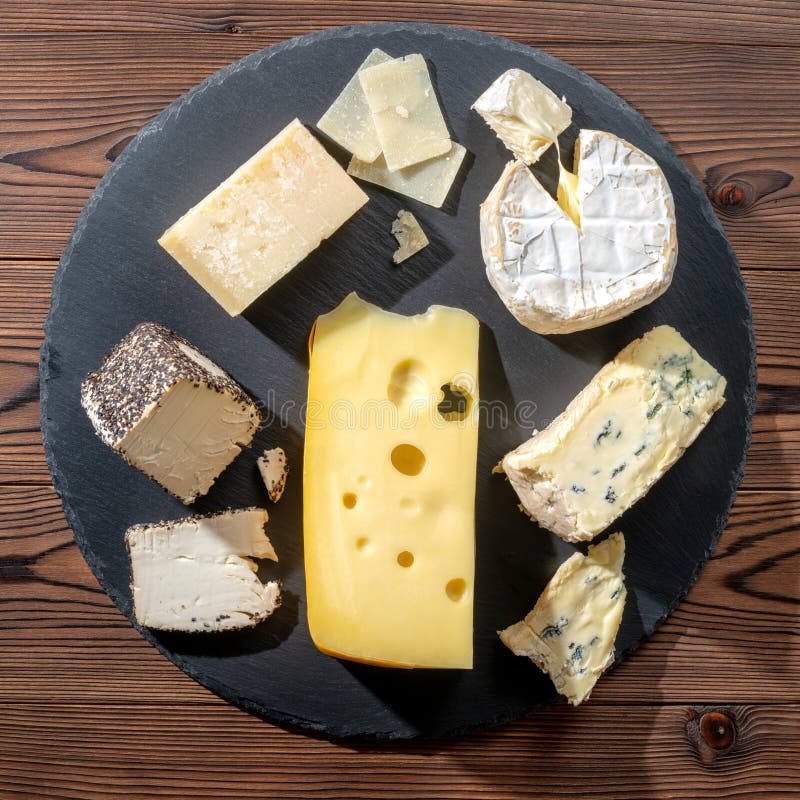 Top View of Tasty Various Types of Cheese on Slate Stone Background ...