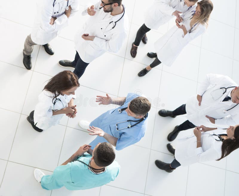 Top View. Team of Medical Professionals Discussing Issues Together ...