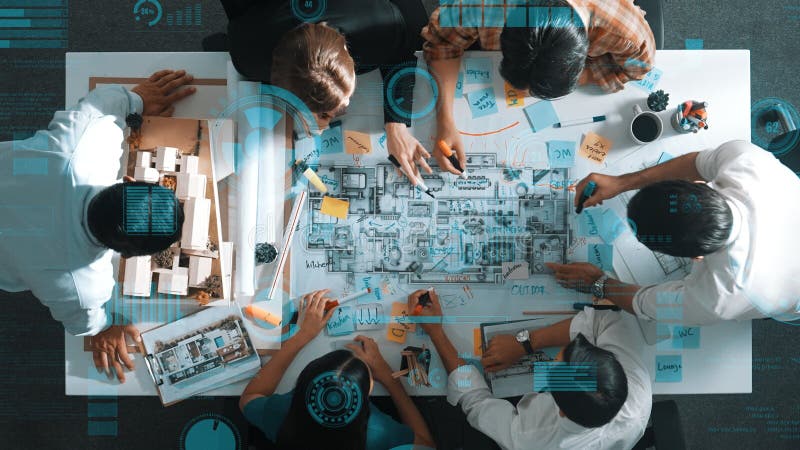 Top View of Team Writing Notes and Stick Note at House Model ...