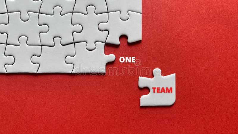 Top View of Text - One Team. on Red Background of White Jigsaw Missing ...