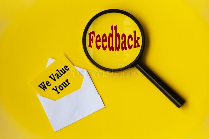 Top View of Text - we Value Your Feedback on Notepad and Magnifying ...