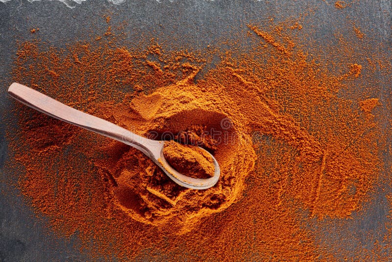 Texture Background. Red Chilli Pepper Powder Mixed with Wooden Spoon ...
