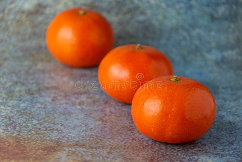 Top View of Three Tangerines Aligned Horizontally, with Selective Focus ...