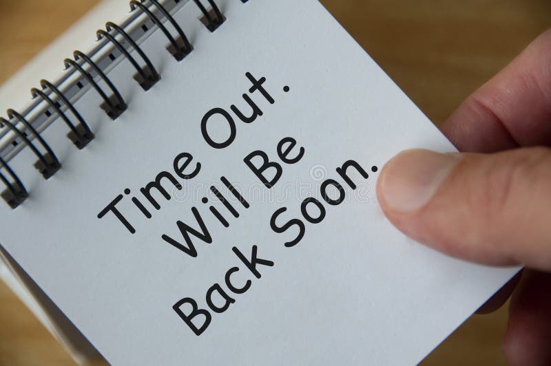 Top View of Time Out. Will Be Back Soon Text on White Notepad. Business ...