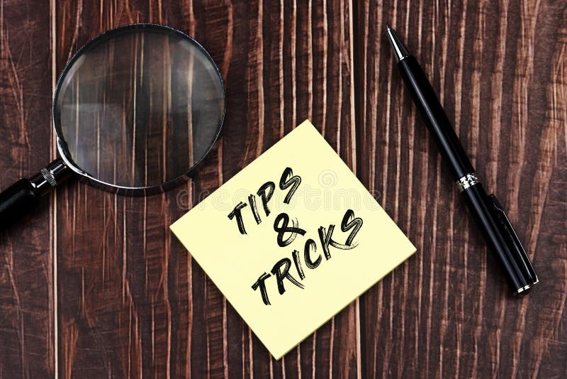Top View of Tips and Tricks Text on Adhesive Note Stock Photo - Image ...