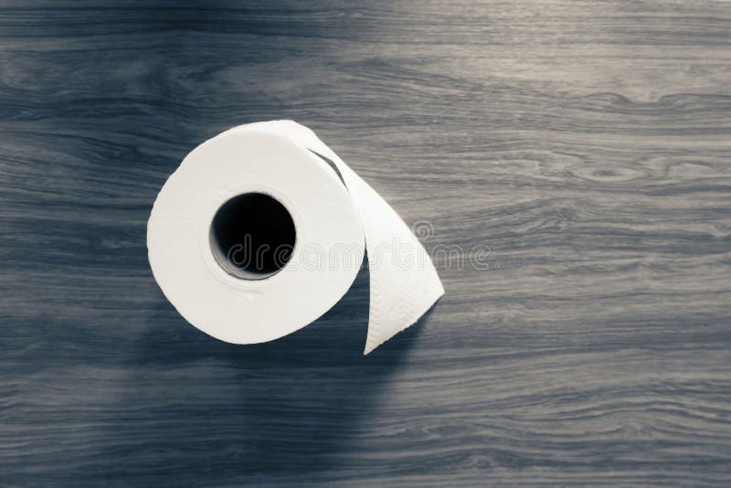 Top View of Tissue Roll Paper on Wooden Table with Dark Tone Stock ...
