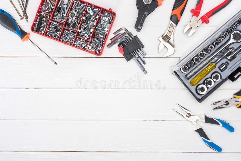 Top View of Tool Set with Tool Boxes on White Wooden Surface Stock ...