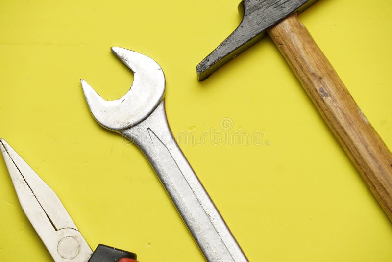 Top View of Tools on Yellow Flat Background. Repair or Maintenance ...