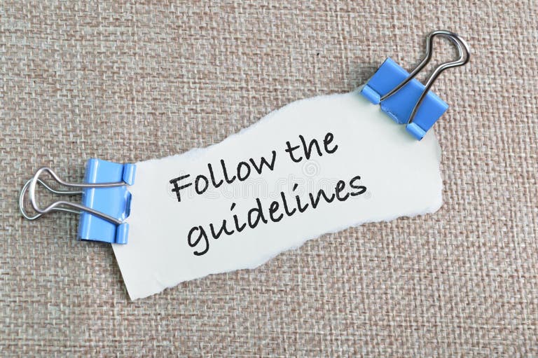 Top View of Torn Paper Written with Text FOLLOW the GUIDELINES Stock ...