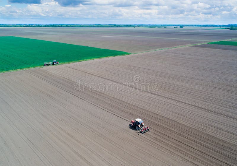 Harrowing a field stock image. Image of combine, golden - 21007033