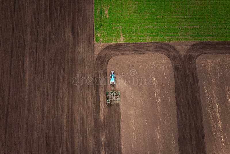 Top View of Tractor Planting Corn Seed in Field, High Angle View Drone ...