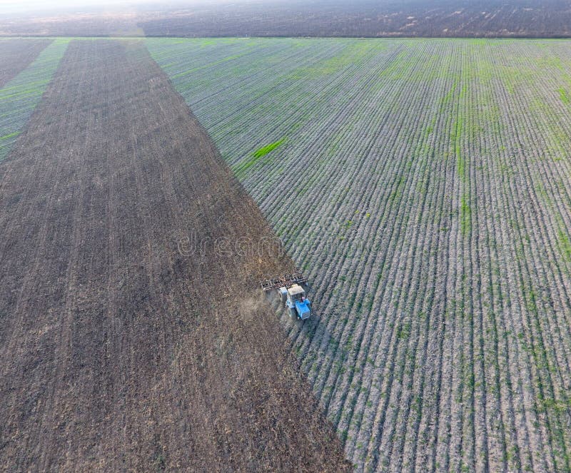 Top View of the Tractor that Plows the Field. Disking the Soil Stock ...