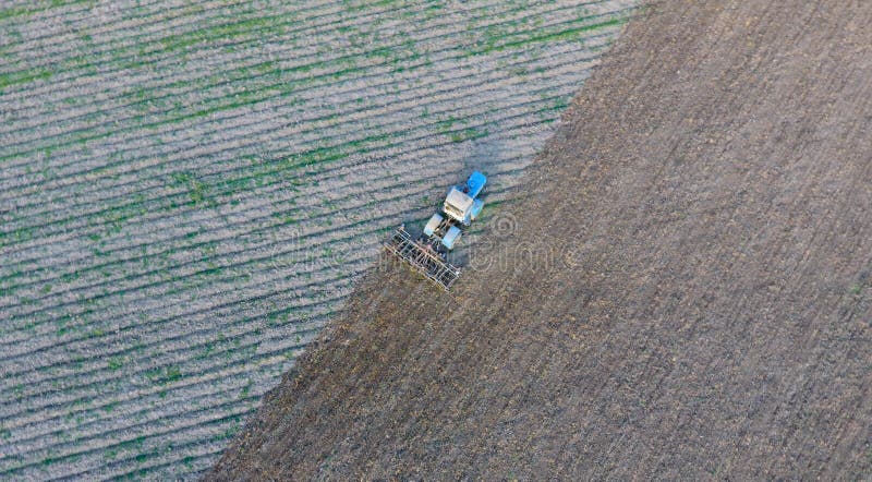Top View of the Tractor that Plows the Field. Disking the Soil Stock ...