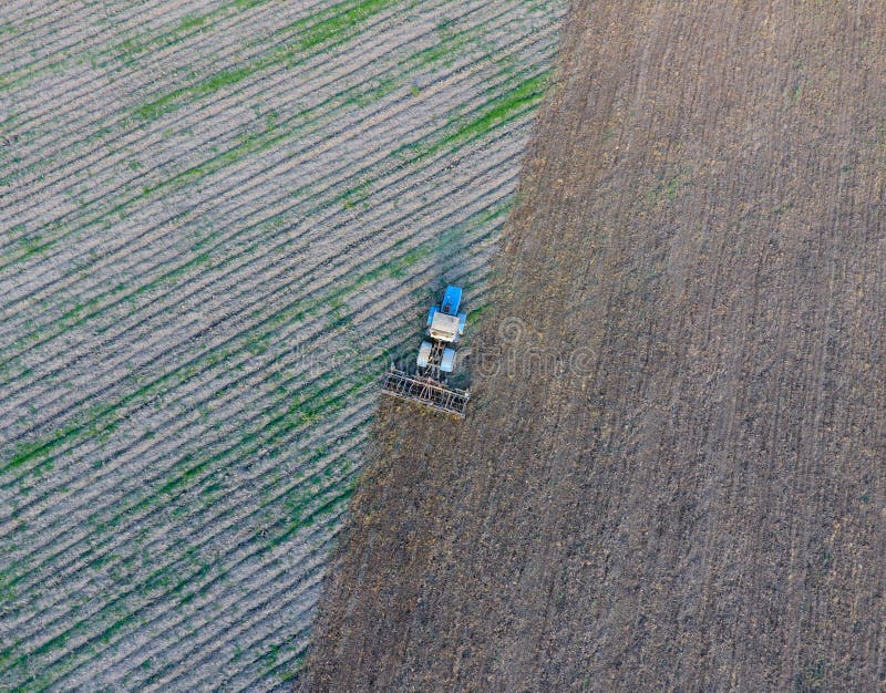 Top View of the Tractor that Plows the Field. Disking the Soil Stock ...
