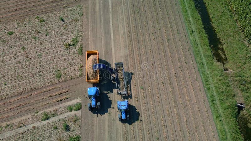Top View of a Tractor Pulling a Harvesting or Loading Implement, in an ...