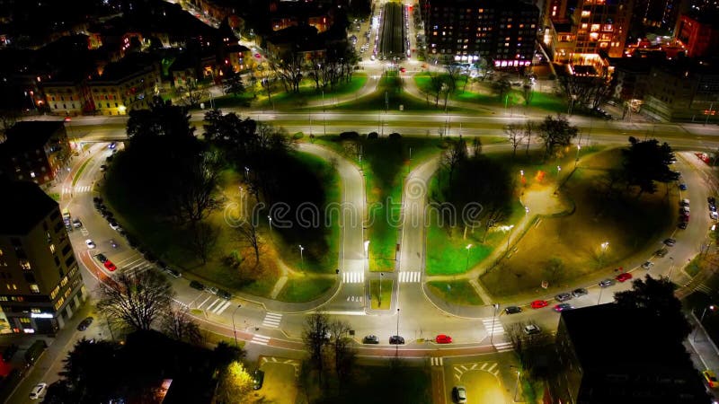 Top View of Traffic on Roundabout Road at an Intersection at Night ...