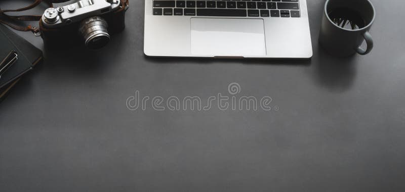 Top View of Trendy Workplace with Laptop Computer and Camera on Black ...