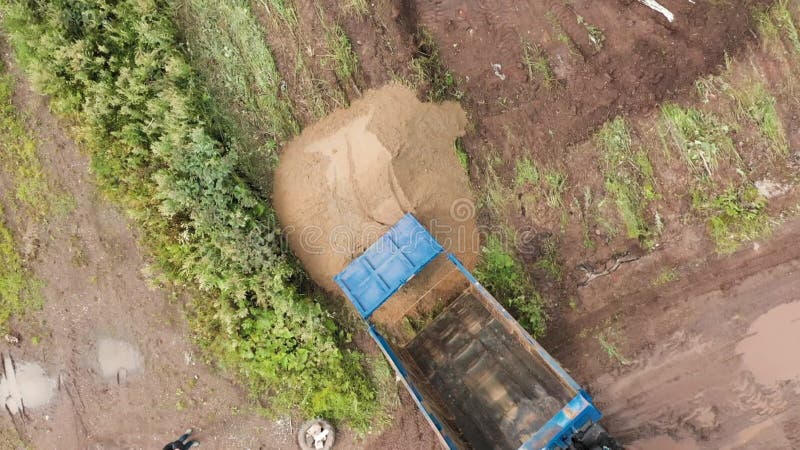 Top View of Truck Dumping Sand on Construction Site. Clip. Truck is ...