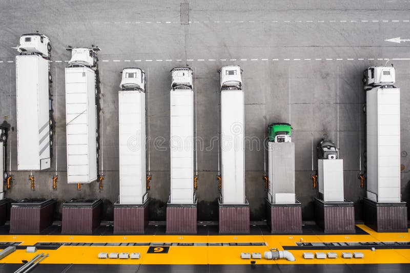 Trucks Loading in the Distribution Hub Stock Image - Image of transport ...