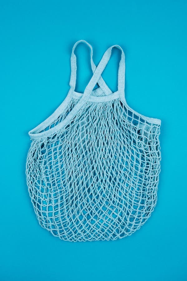 Empty Reusable String Eco Bag for Shopping on Blue Background. Zero ...