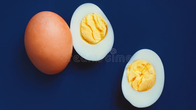 Top View of Two Boiled Eggs, One Egg Still in the Shell, and the Other ...
