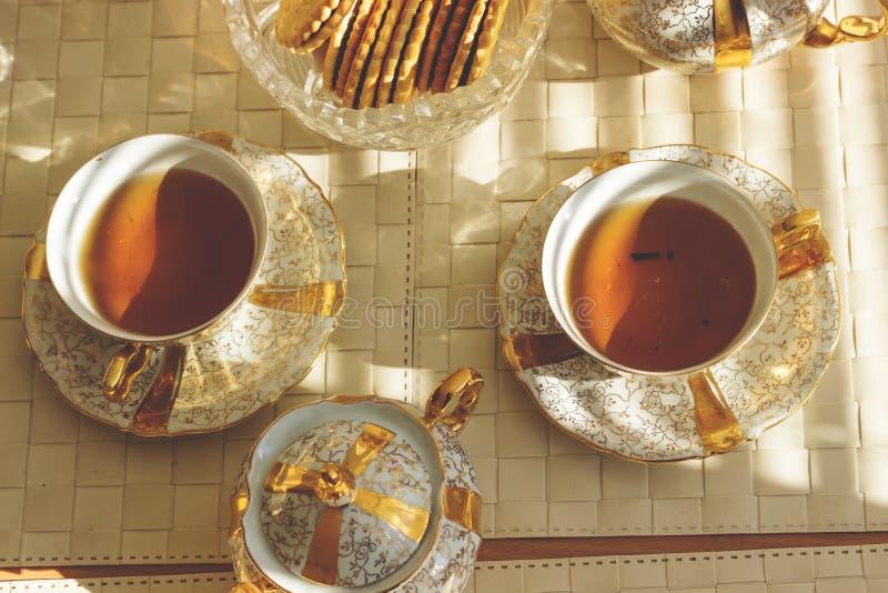 Top View of Two Cups of Tea on Wooden Table. Toned. Stock Image - Image ...