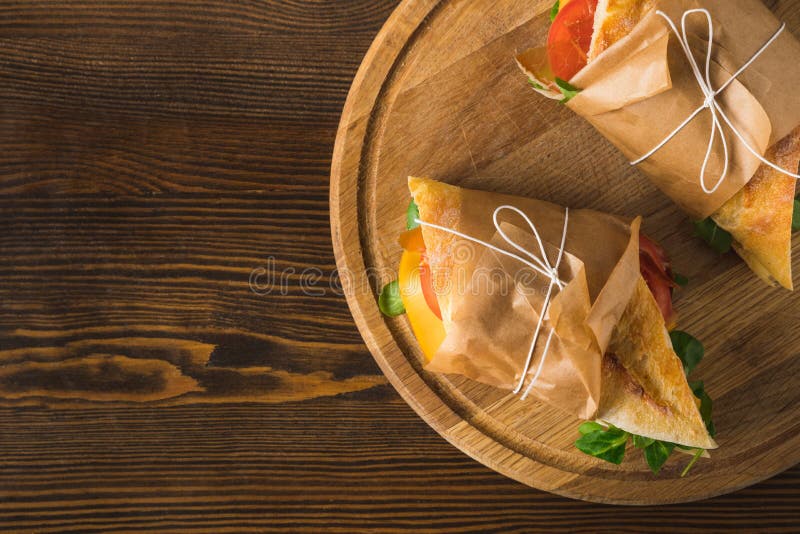 Two Delicious Panini on Cutting Board Stock Image - Image of panini ...