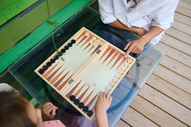 Top View of Two People Playing Backgammon, Enjoying Leisure Time ...