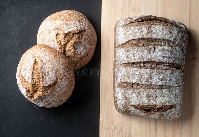 Top View of Two Types of Bread, One on a Wooden Board, and the Second ...