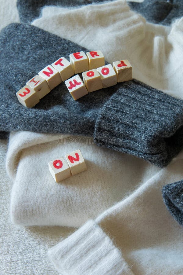 Top View of Two Woolen Sweaters with `Winter Mood on ` Text, for Him ...