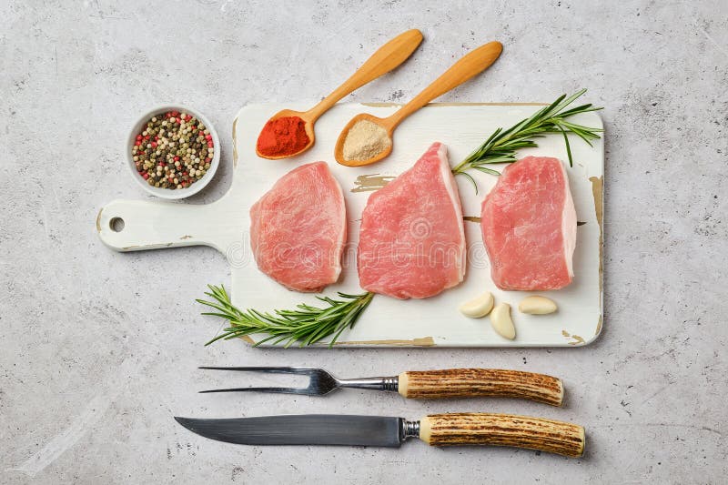 Top View of Uncooked Pork Cutlets on Cutting Board Stock Image - Image ...