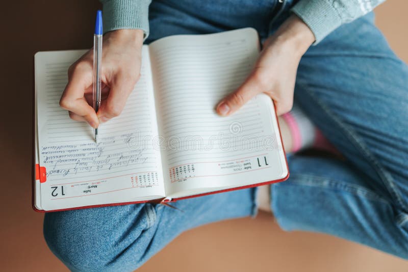 Top View Unrecognizable Man Sits on Floor and Holds in His Hands Diary ...