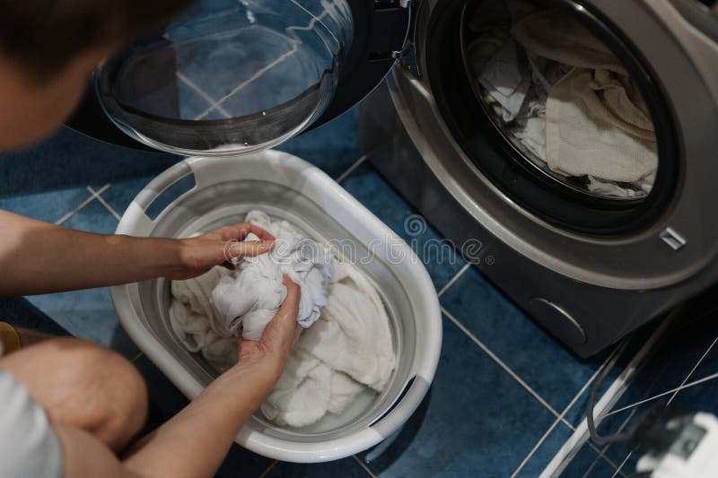 Top View of Unrecognizable Young Man Soaking White Clothes in Basin ...