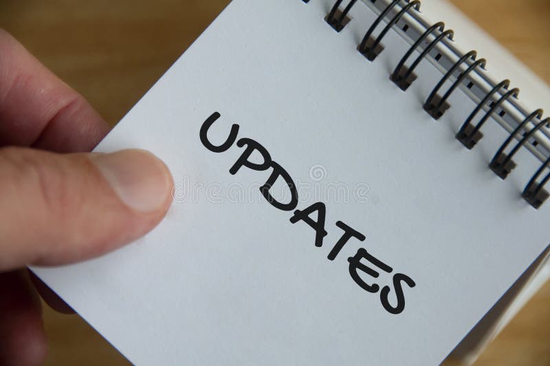 Top View of Update Text on White Notepad. Business Update Concept Stock ...