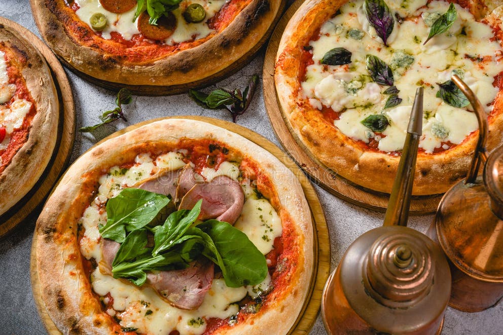 Top View of Various Neapolitan Pizzas on Grey Stone Table Stock Image ...
