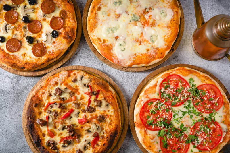 Top View of Various Neapolitan Pizzas on Grey Stone Table Stock Image ...