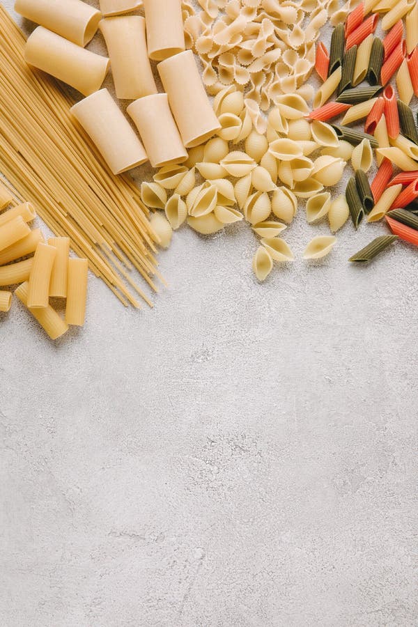 Top View of Various Raw Pasta Spilled on Concrete Surface Stock Image ...